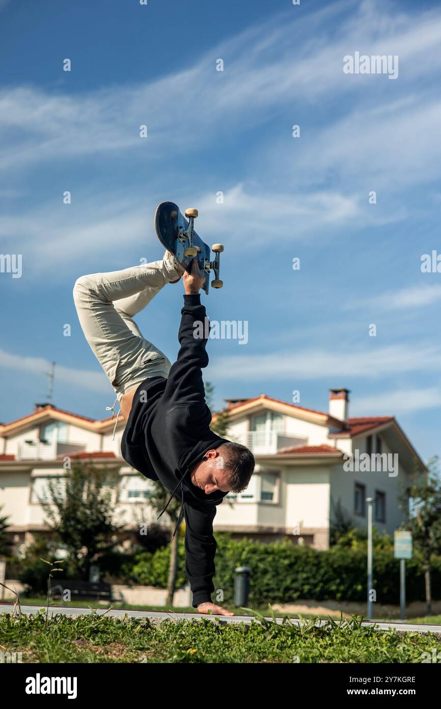 vertical skater performing an impressive aerial maneuver, lifting their ...