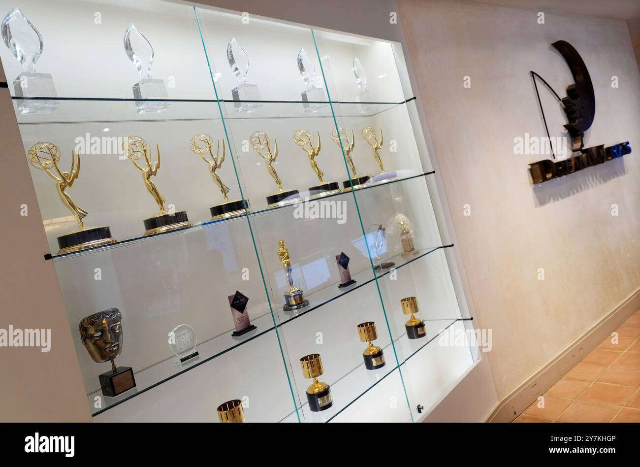 Awards for DreamWorks Animation films are featured behind a glass ...