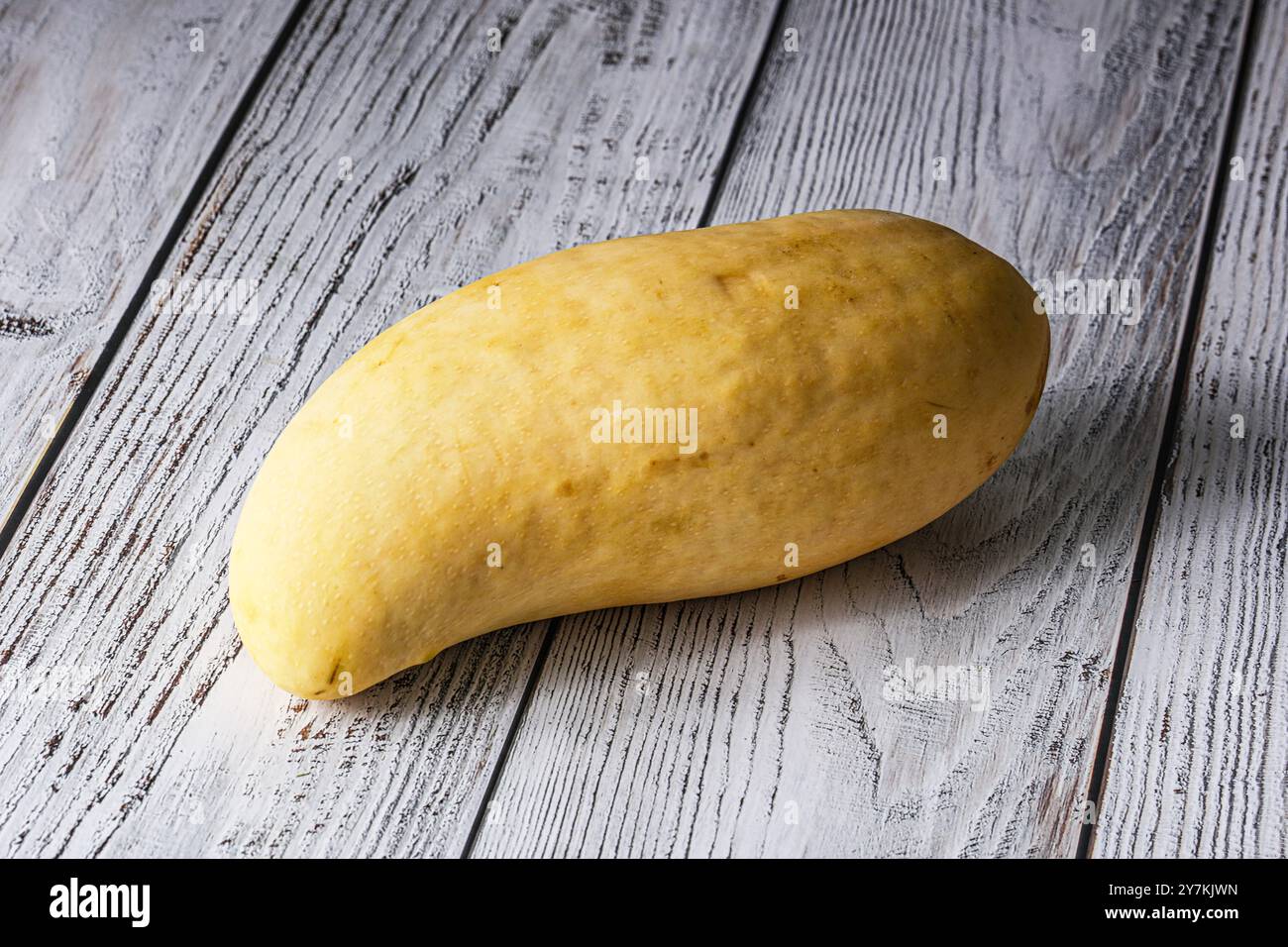 Tropical exotic fruit - ripe yellow mango Stock Photo - Alamy