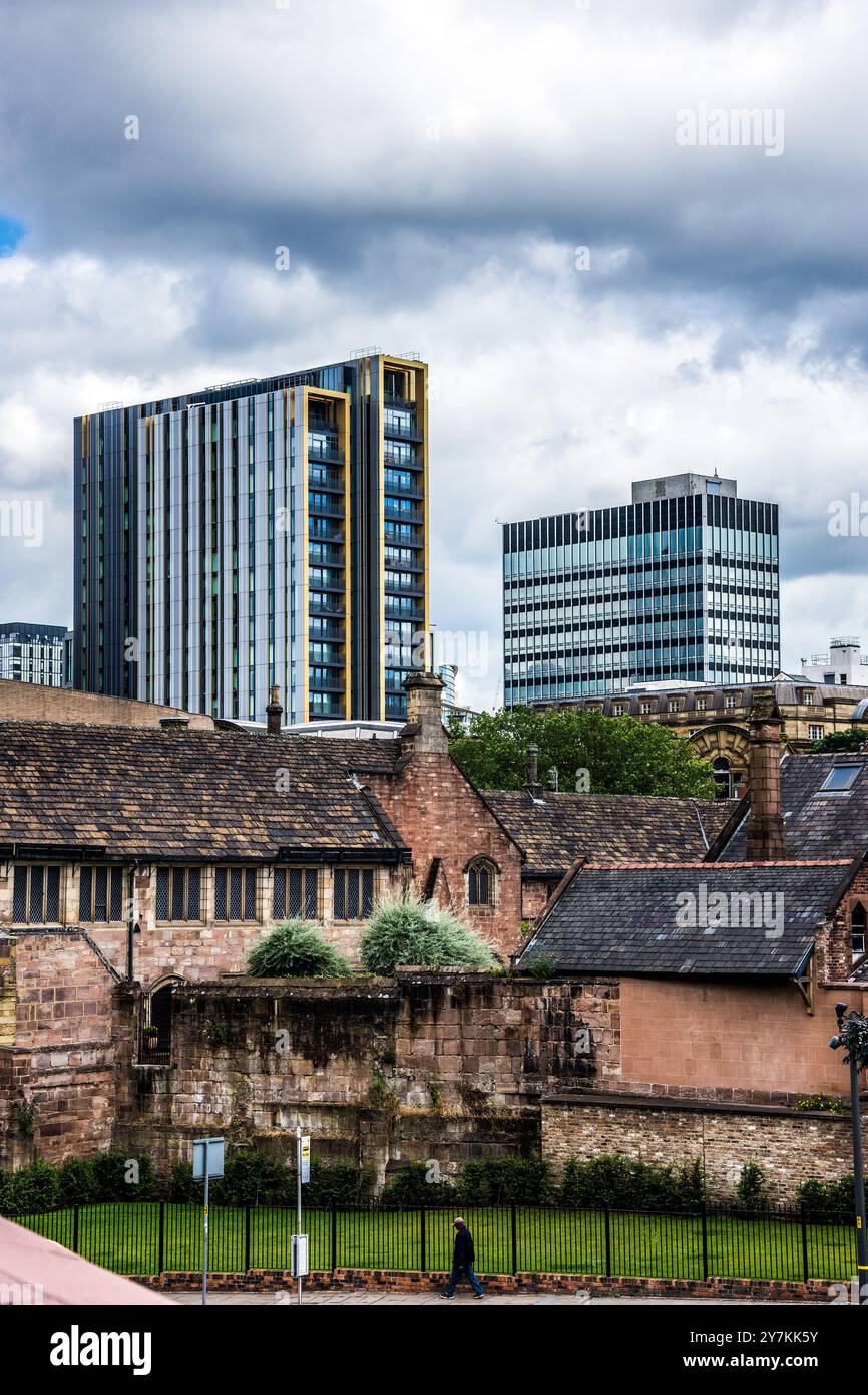Modern apartments overlook older buildings from another era Stock Photo ...