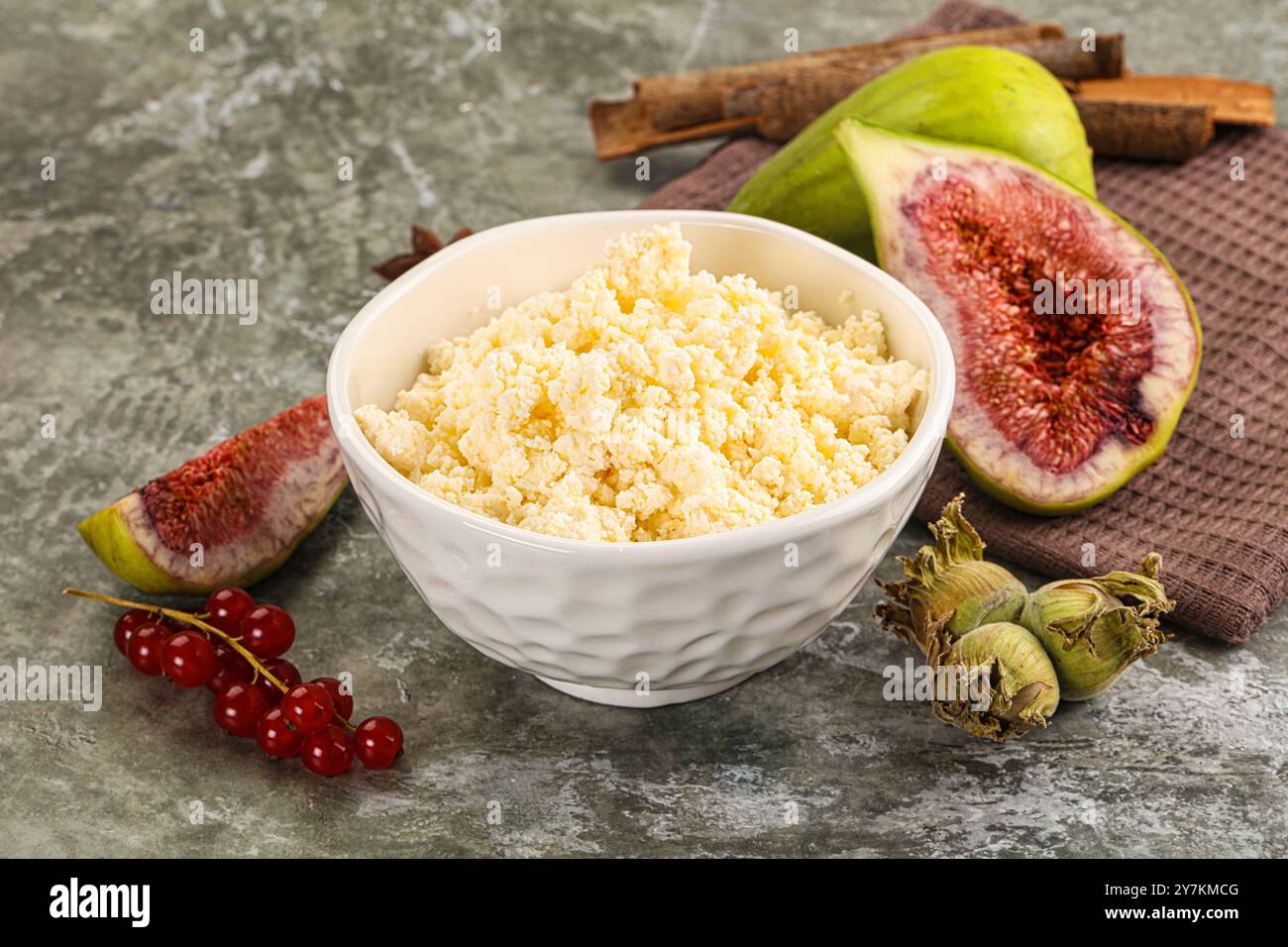 Delicous sheep cottage cheese curd served fig Stock Photo - Alamy