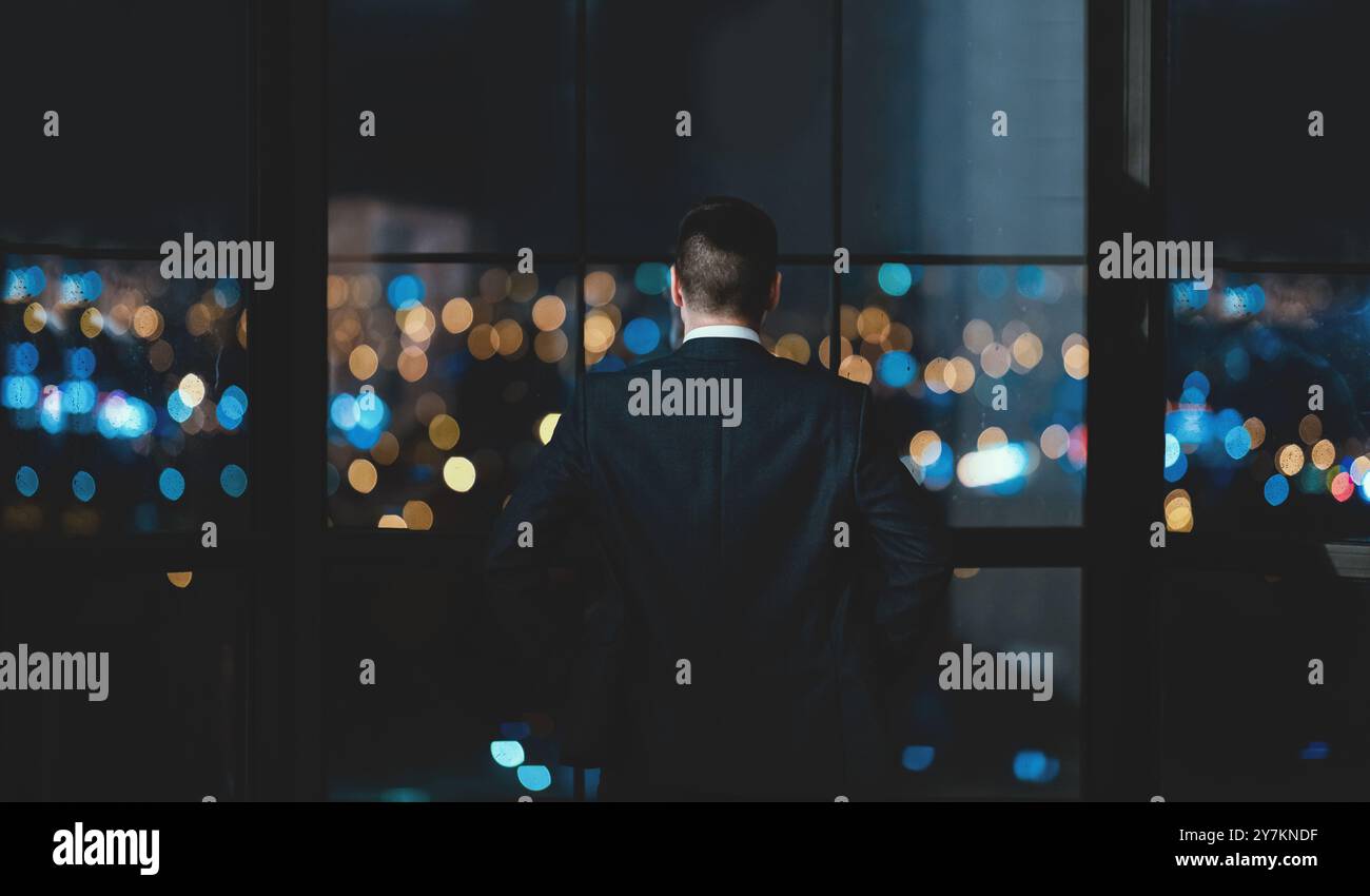 Silhouette man standing panoramic window hi-res stock photography and ...
