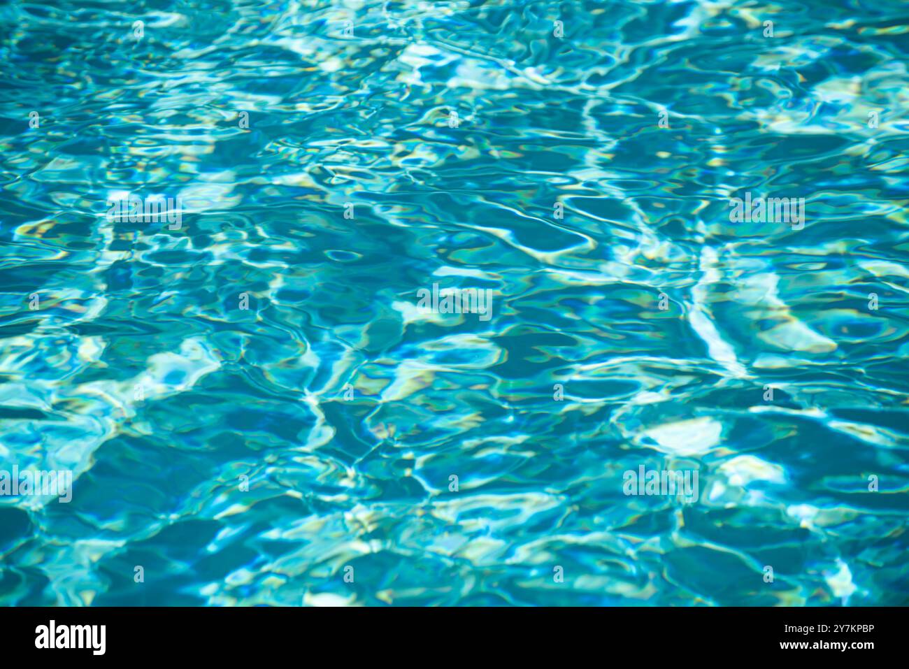 Water in swimming pool, background with high resolution. Wave abstract or rippled water texture ...
