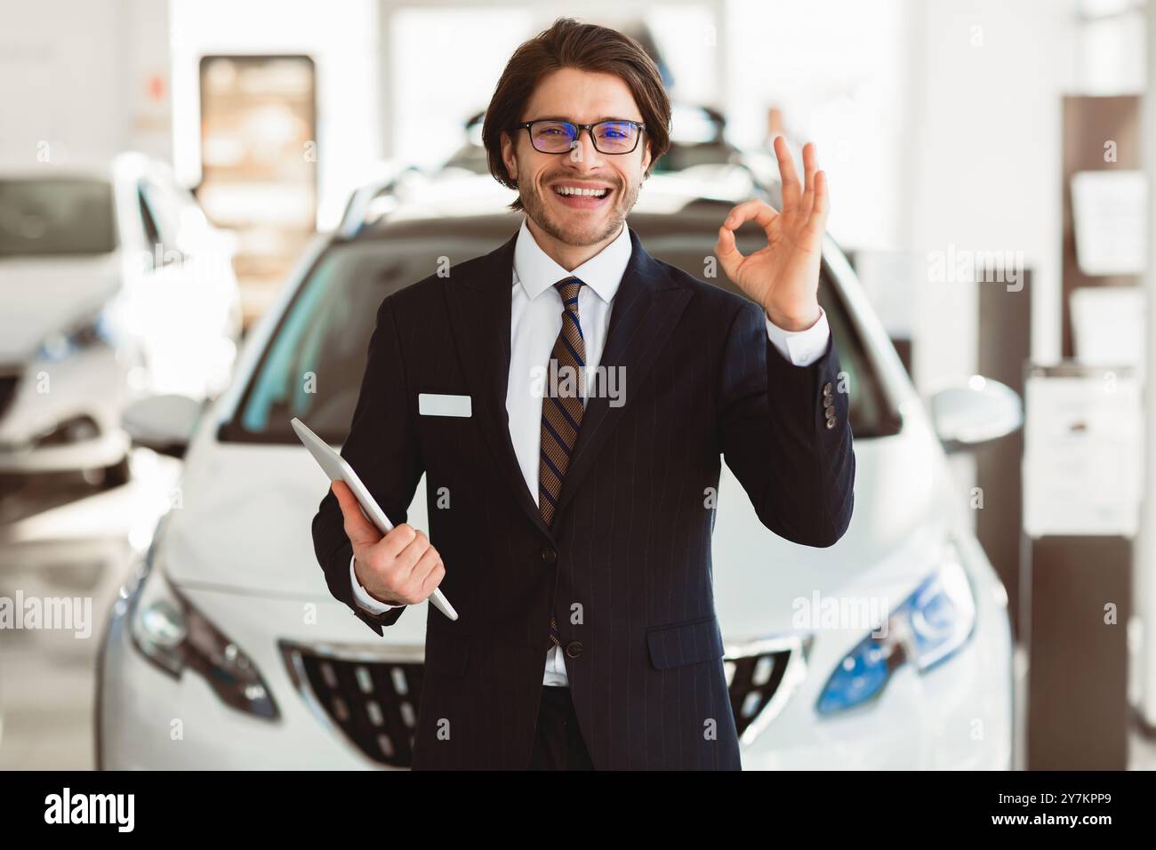 Car salesman advertising new hi-res stock photography and images - Alamy