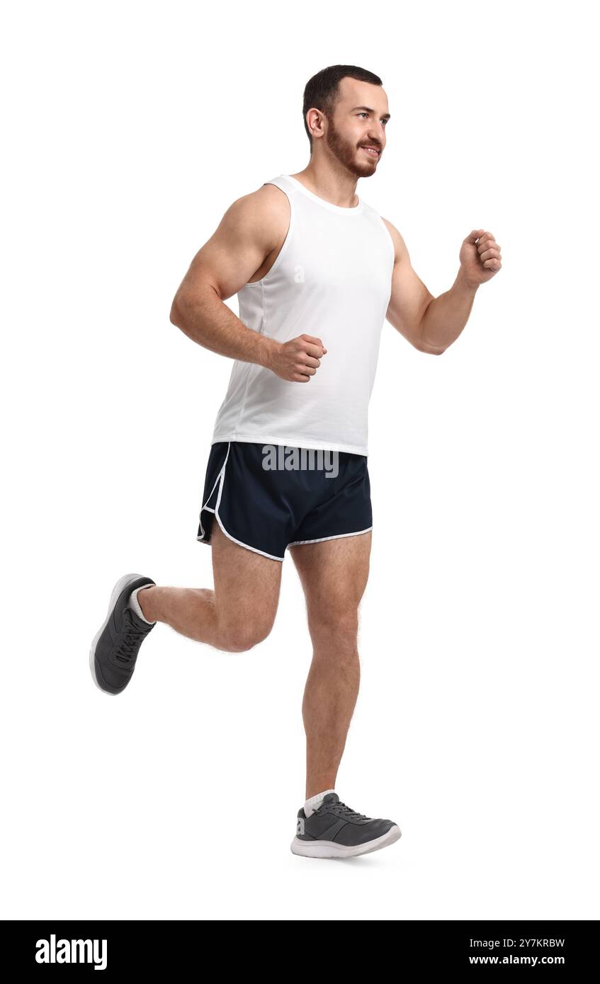Handsome young man running on white background Stock Photo - Alamy