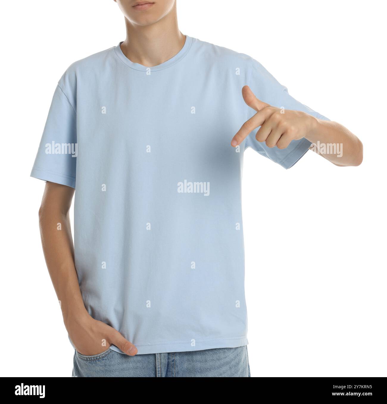Teenage boy wearing light blue t-shirt on white background, closeup ...