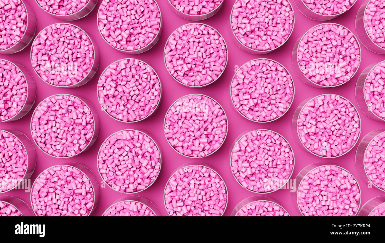 Top view on grid of glasses filled with pink plastic polypropylene ...