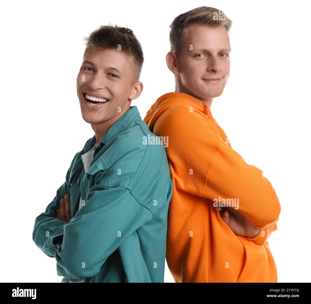 Two happy brothers posing with crossed arms on white background Stock ...