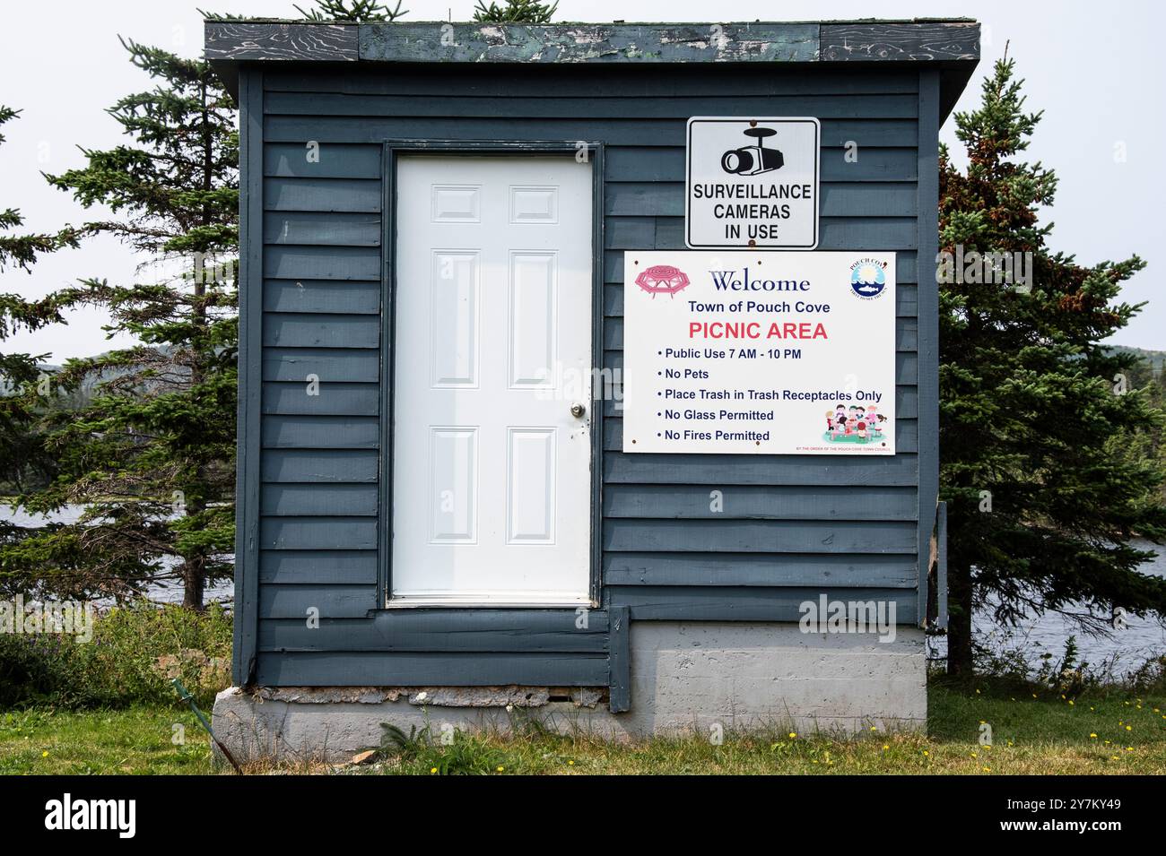 Welcome to the picnic area and surveillance cameras signs at Shoe Cove ...