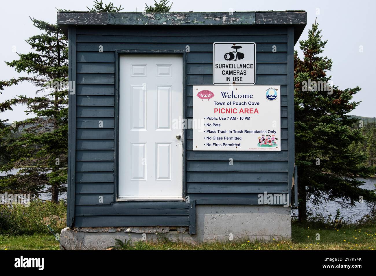 Welcome to the picnic area and surveillance cameras signs at Shoe Cove ...