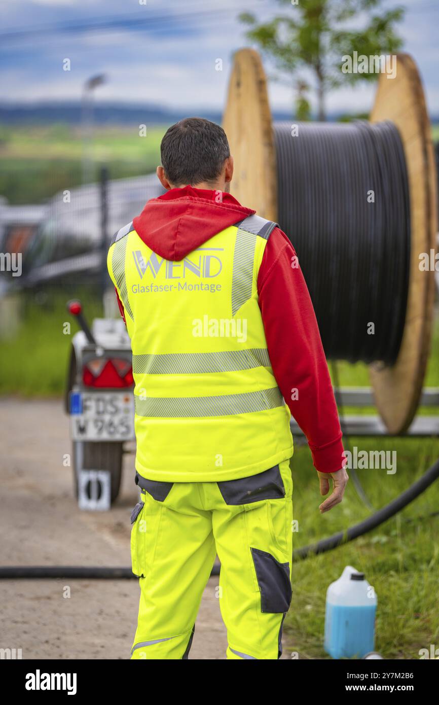 Fibre cable worker road hi-res stock photography and images - Alamy