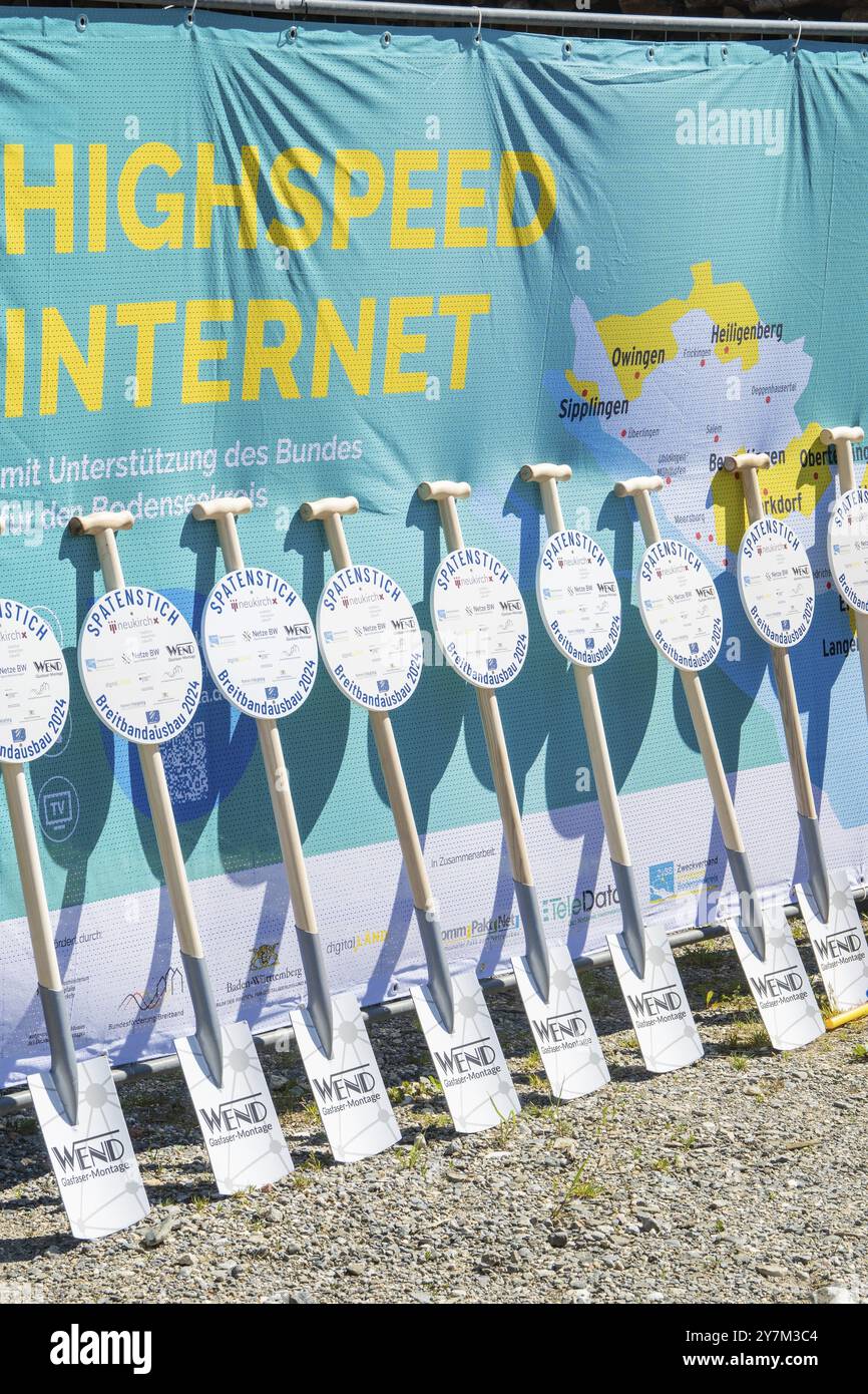 Advertising banner for high-speed Internet with shovels lined up in ...