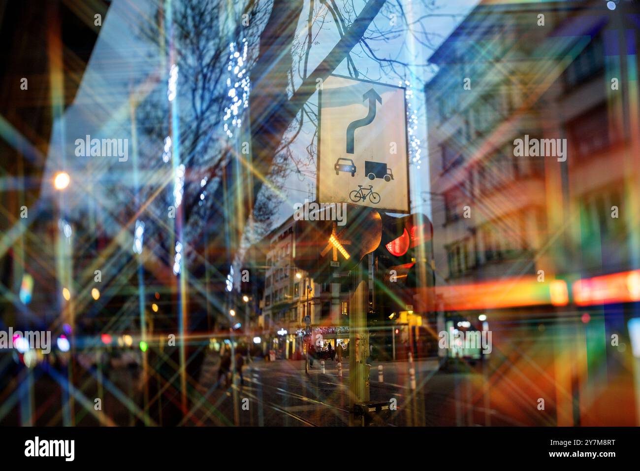An urban street scene with a traffic sign, layered with abstract light ...