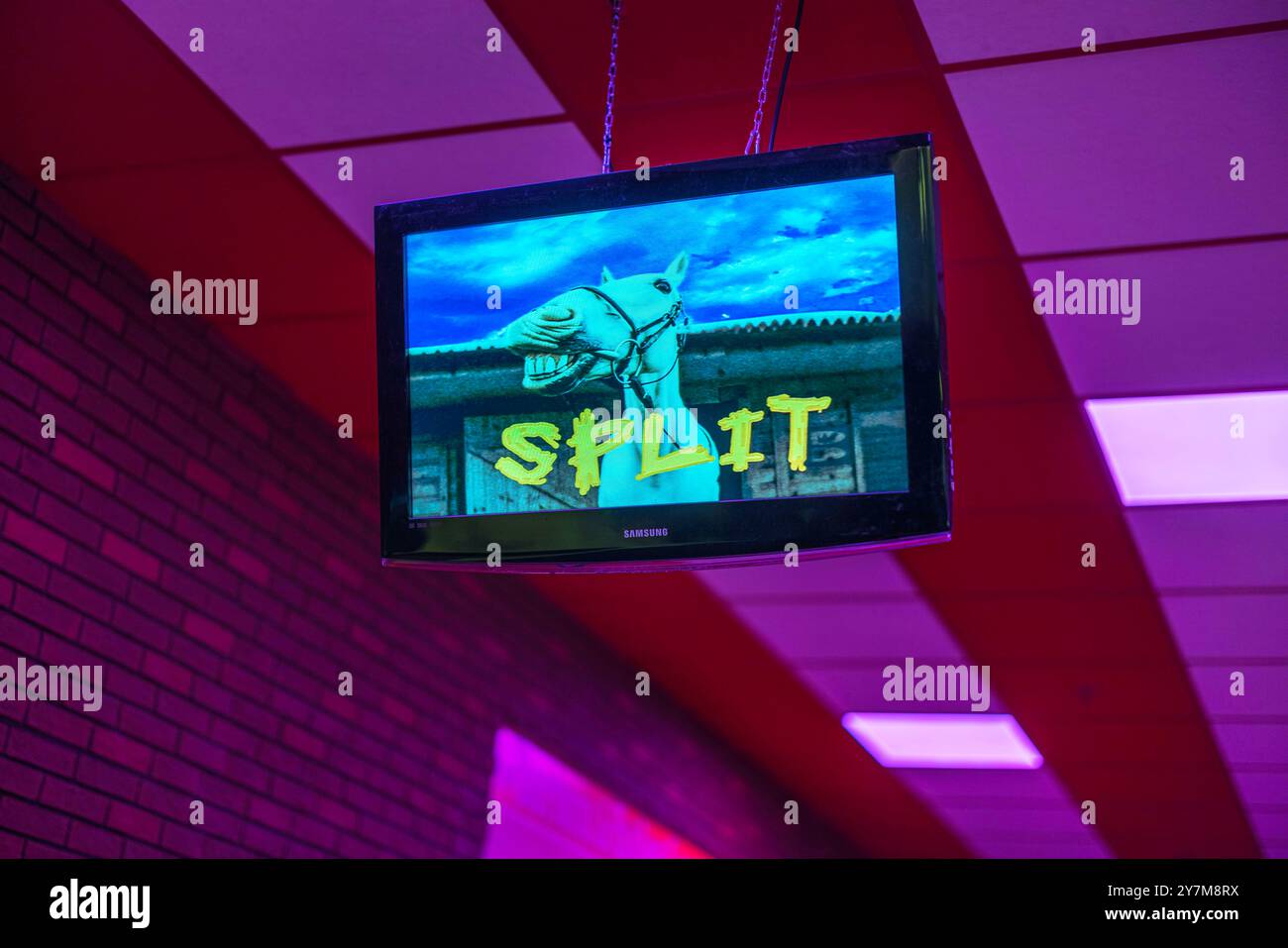 Television screen in bowling alley showing word 'Split' after client ...