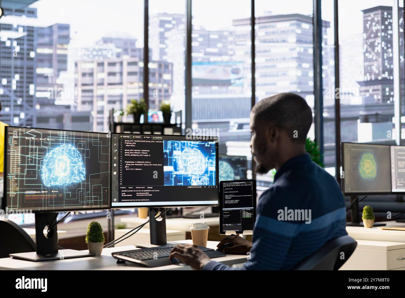 Technician testing AI company software, identifying bottlenecks in ...