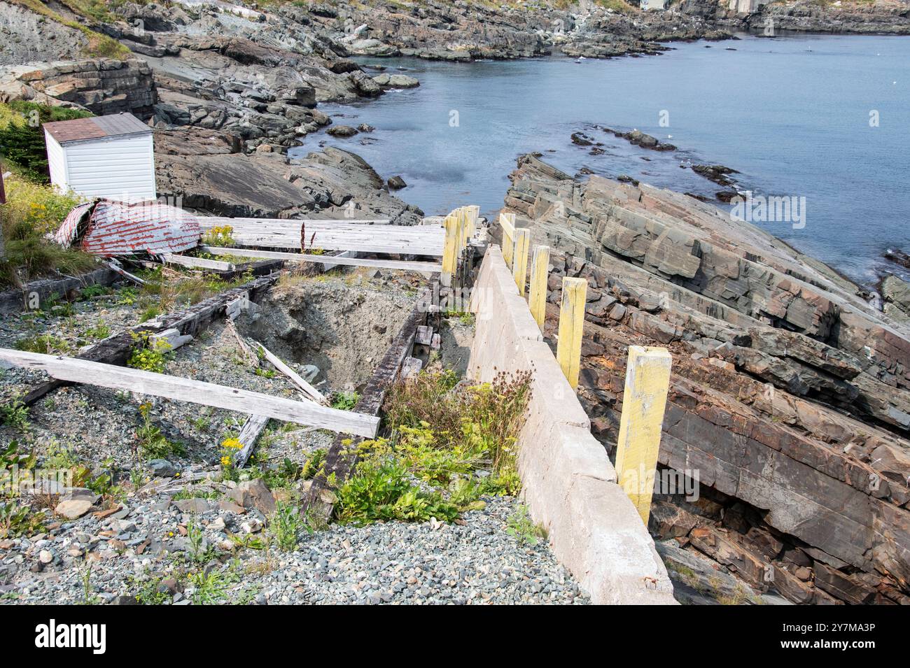 Structural remains of the abandoned dilapidated boat ladder in Pouch ...