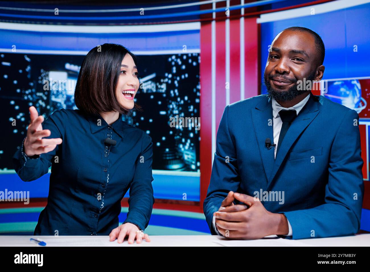 TV show hosts presenting breaking news live on television network ...