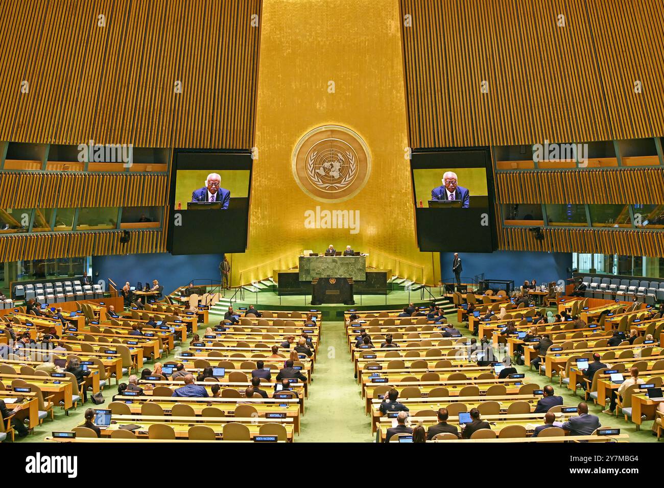 United Nations. 30th Sep, 2024. UNGA President Philemon Yang (C and on the screens) is seen ...