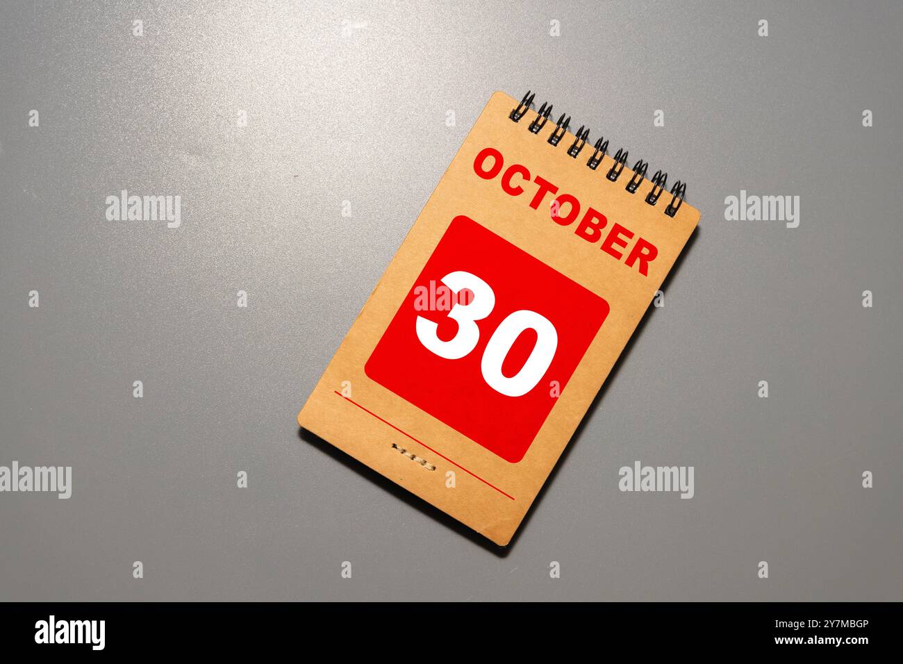 Wooden calendar with the date October 30 on desktop with laptop Stock ...