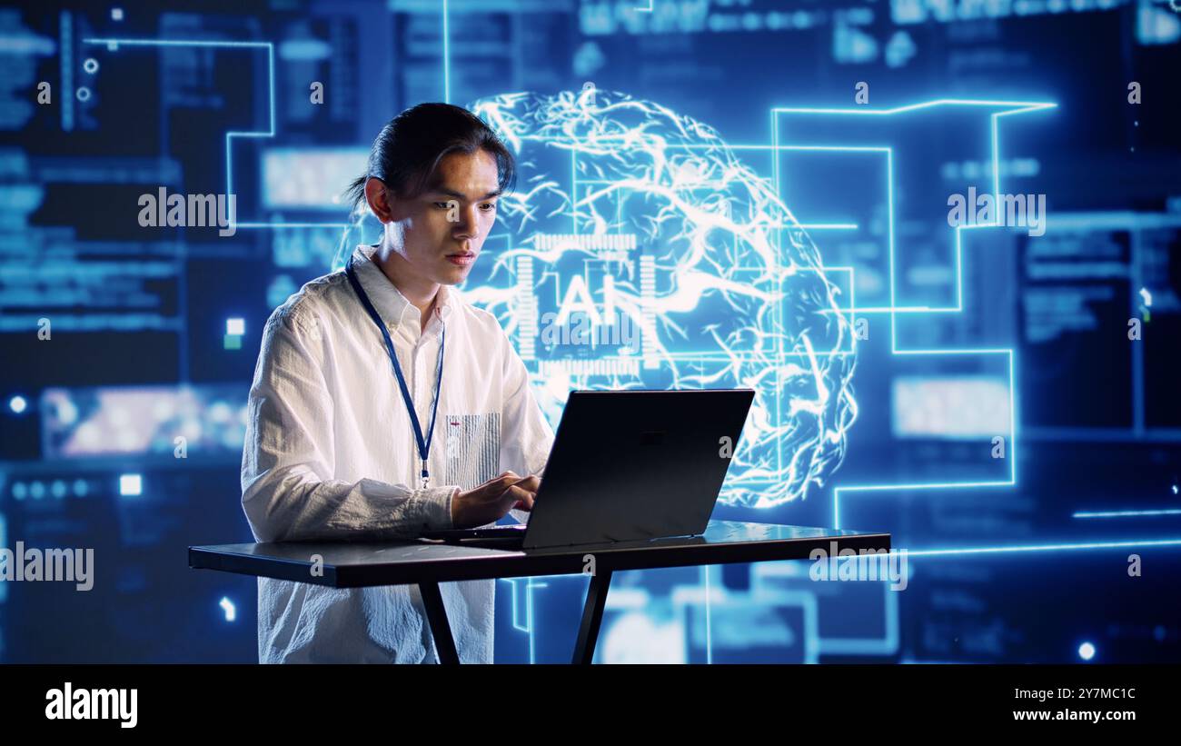 Engineer in technologically advanced workplace uses artificial intelligence computing simulating ...