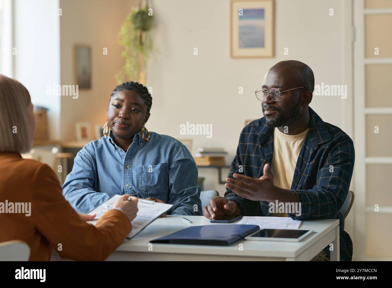 Adult couple banking agent hi-res stock photography and images - Alamy