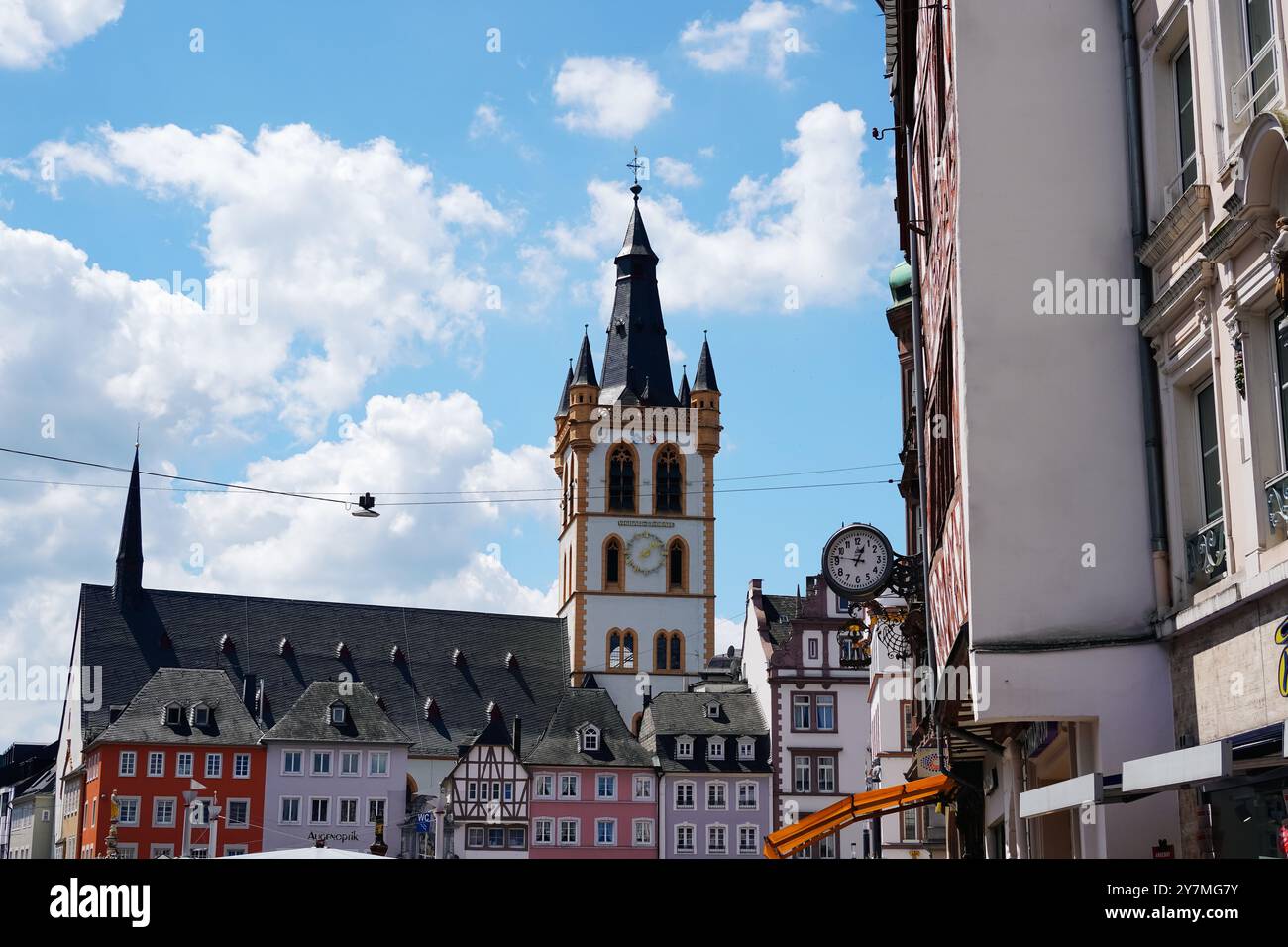 The bell tower of Saint Gangolf church and Beautiful historic Hauptmark ...