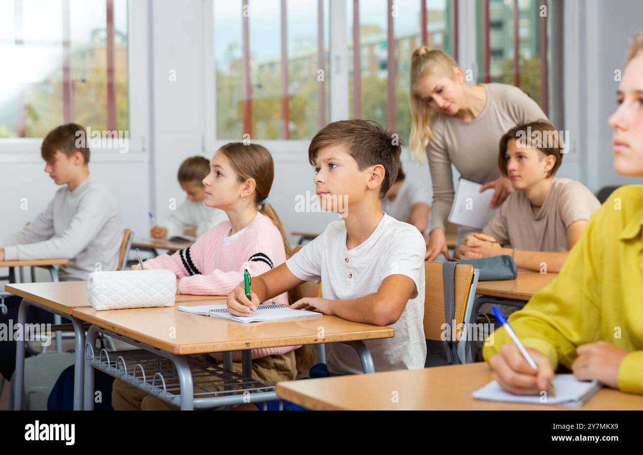 Student is sitting test and answer about task in classroom Stock Photo ...