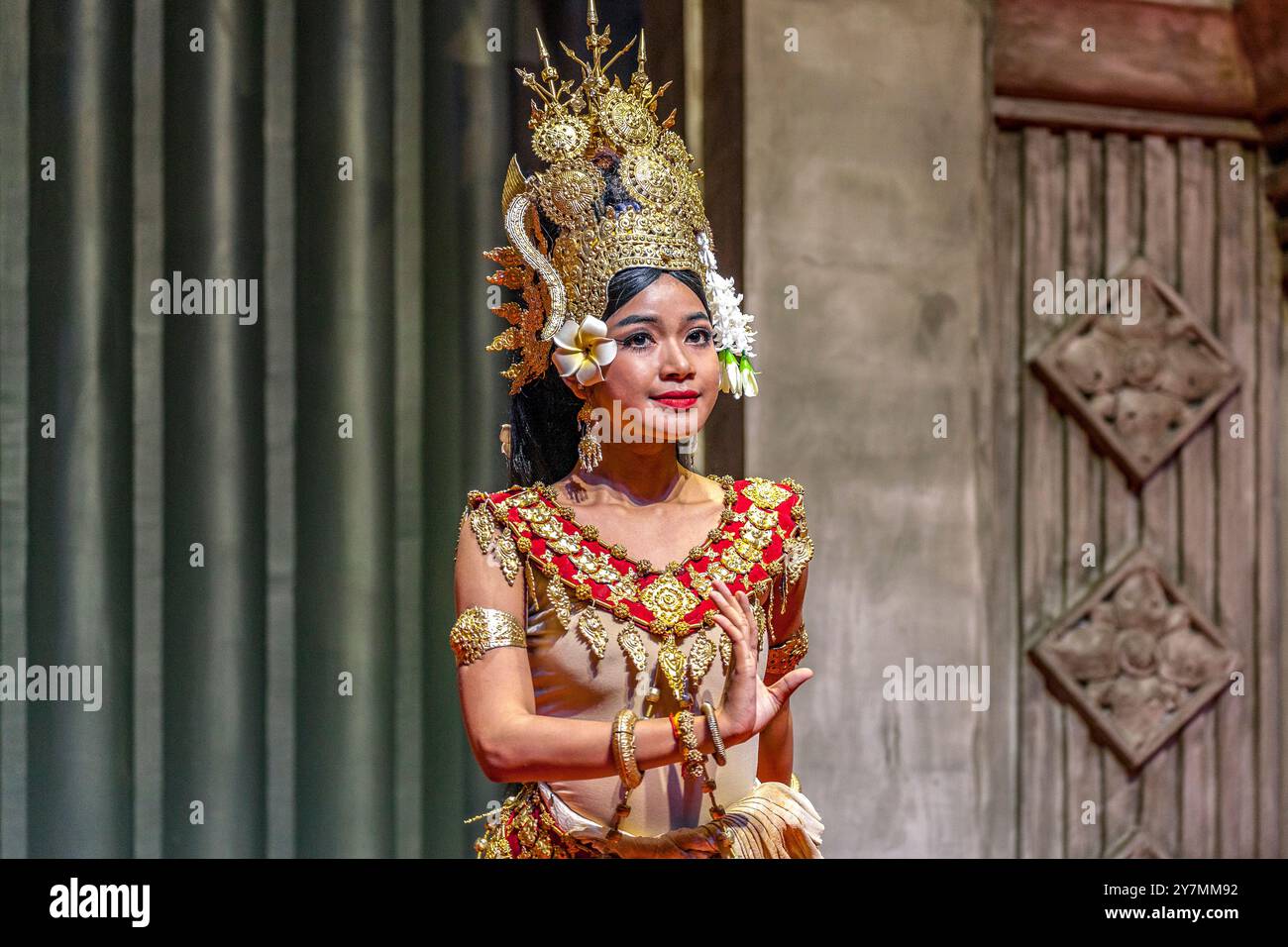 Young female Cambodian dancer performing a Khmer classical dance, the ...