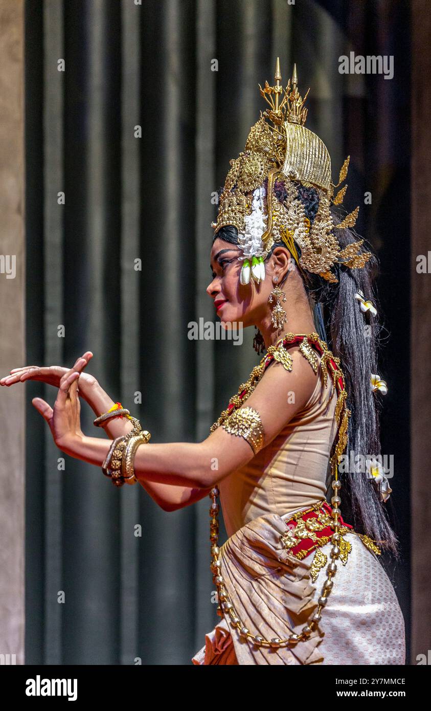 Young female Cambodian dancer performing a Khmer classical dance, the ...