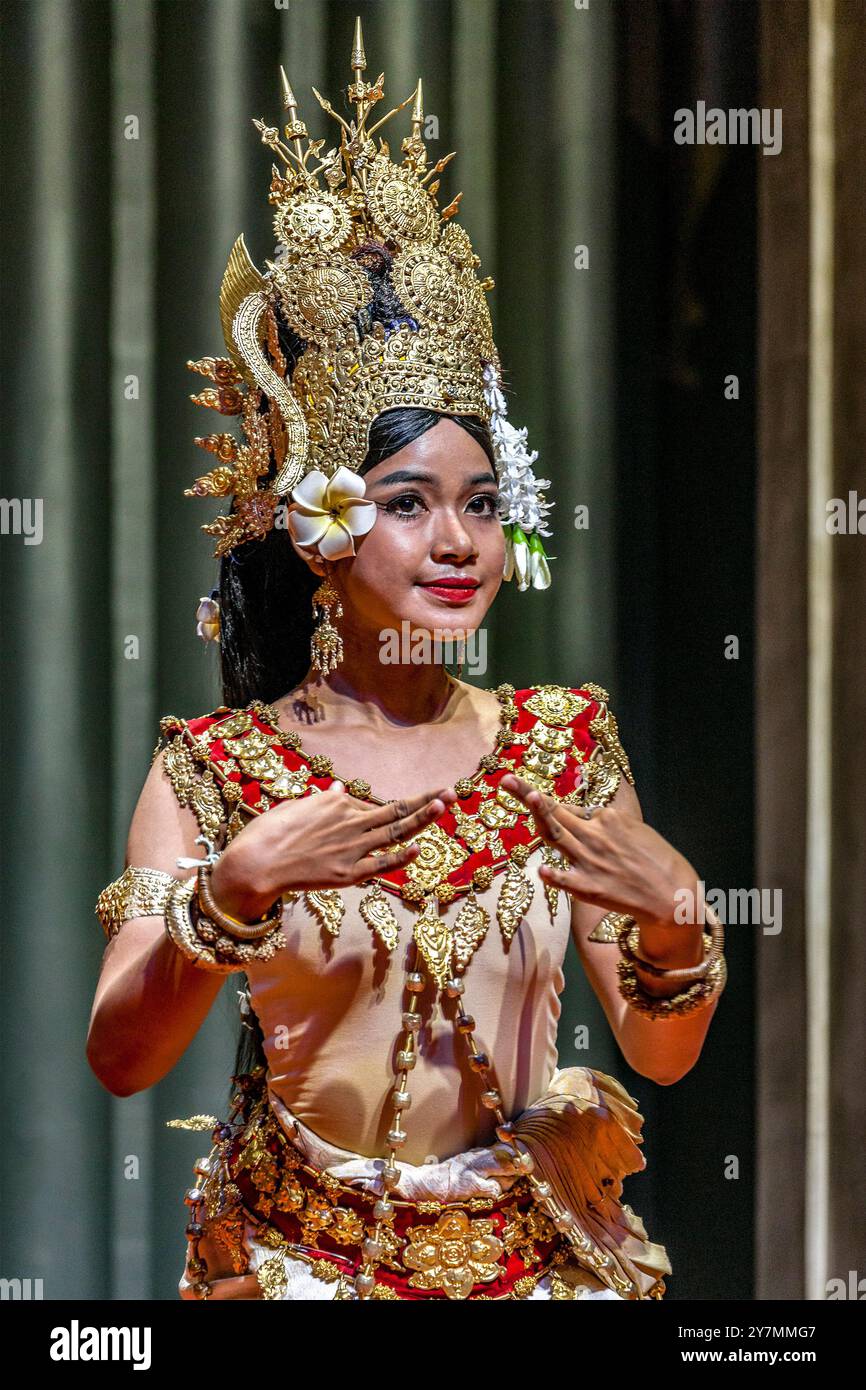 Young female Cambodian dancer performing a Khmer classical dance, the ...