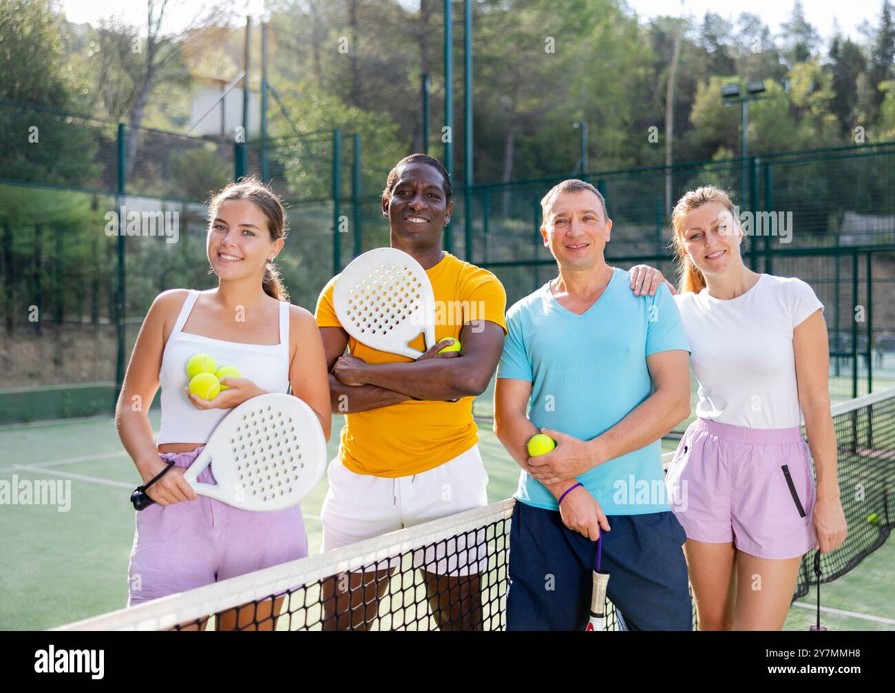 Portrait of four positive and confident tennis players Stock Photo - Alamy