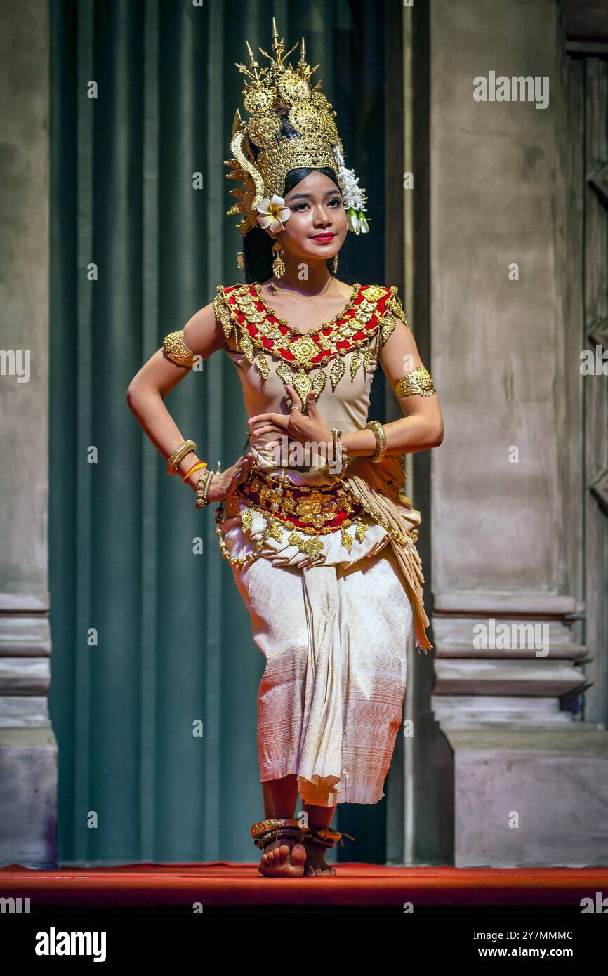 Young female Cambodian dancer performing a Khmer classical dance, the ...