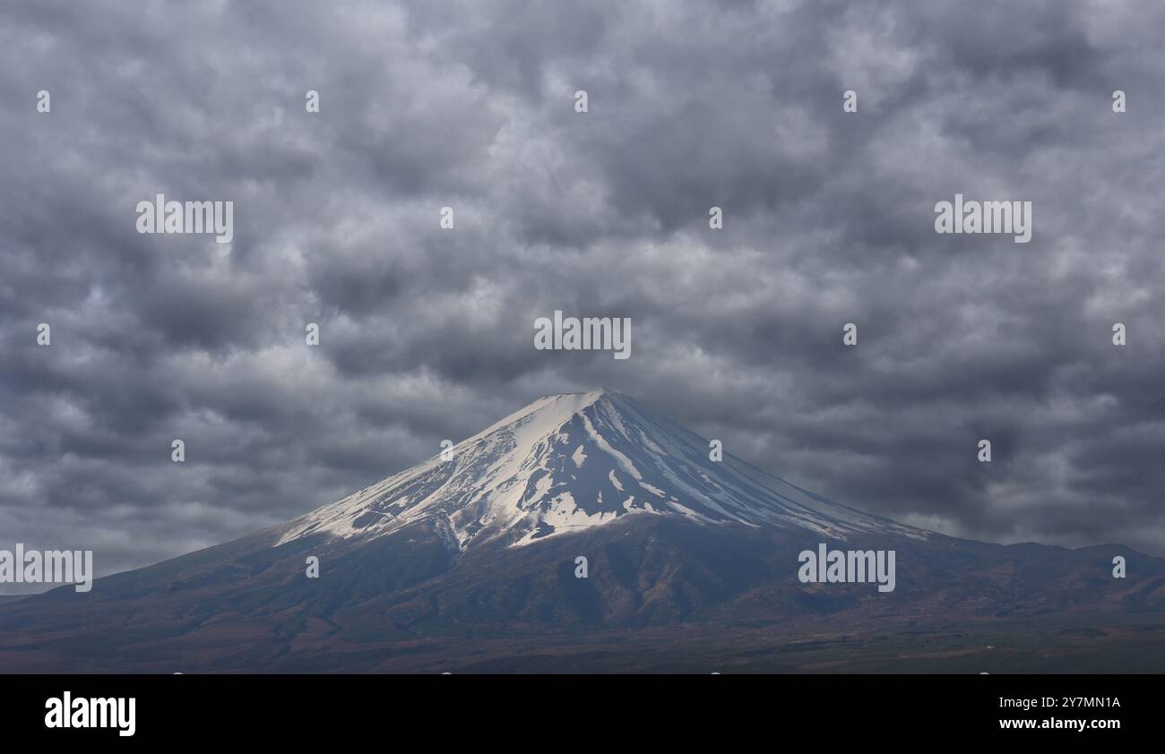 Mount Fuji on a day when the rain clouds are coming background. View of ...