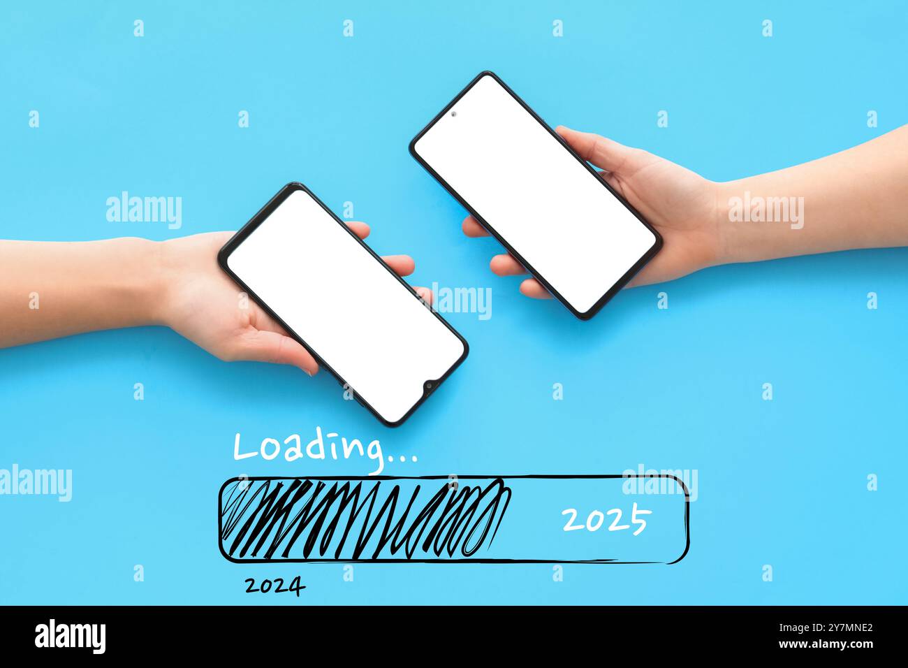 Hands holding mobile phones and status bar with year 2024 and 2025 on ...