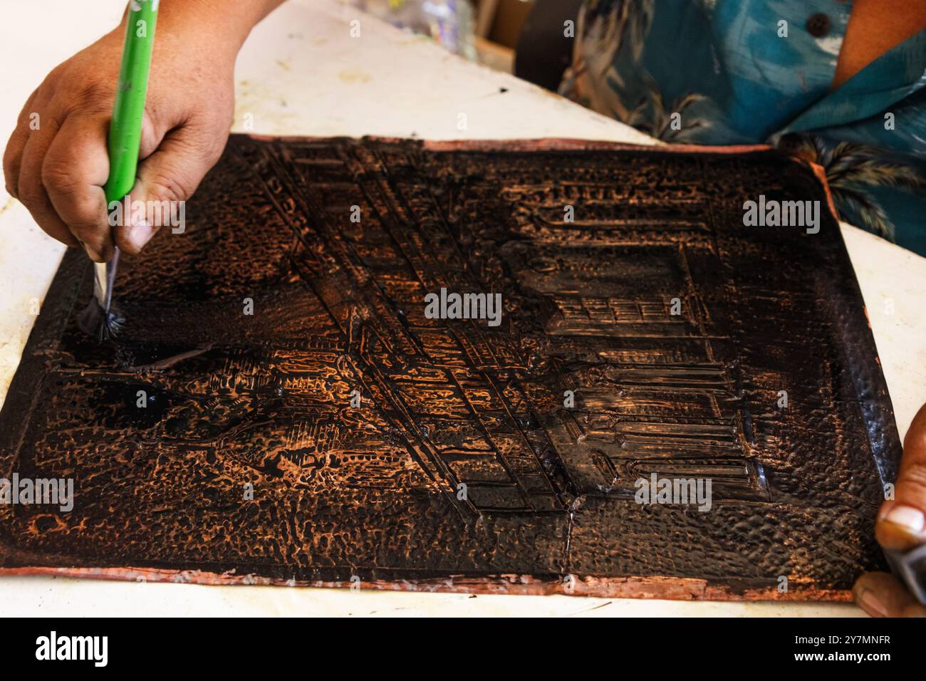 Detailed view of a copper sheet engraved with a traditional balcony ...