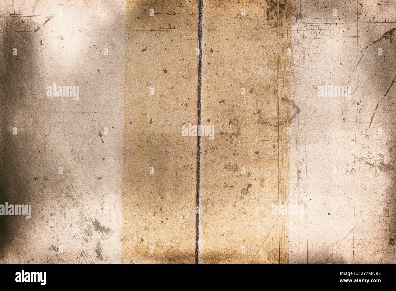 The top of the cardboard has adhesive tape on it and there are dirt ...