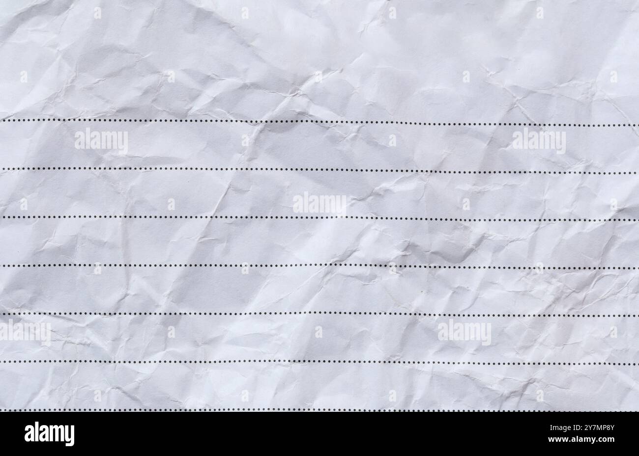 This image features a crumpled paper background with horizontal lines ...