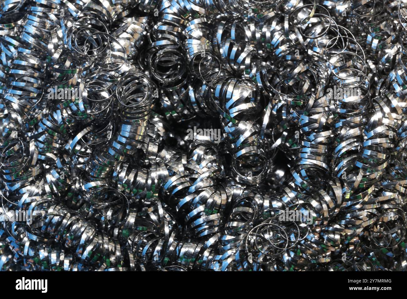 Scrap iron cut from steel bars in lathes background by this steel mill ...