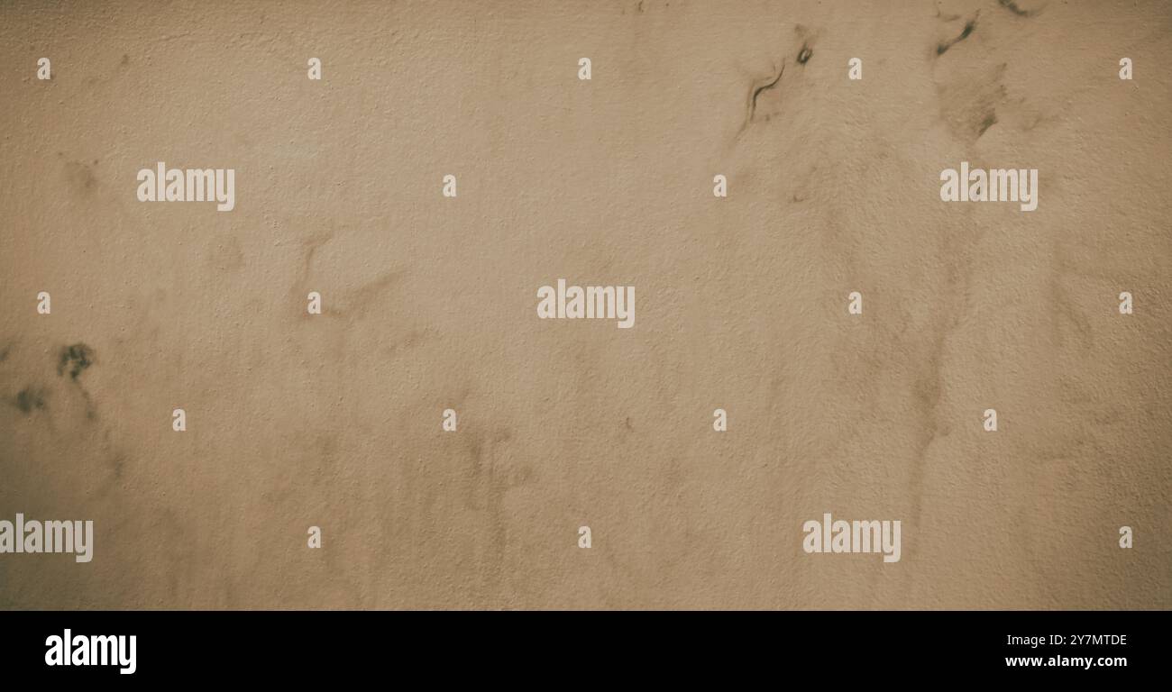 brown cement wall with dirt stains background and wall is stained with ...