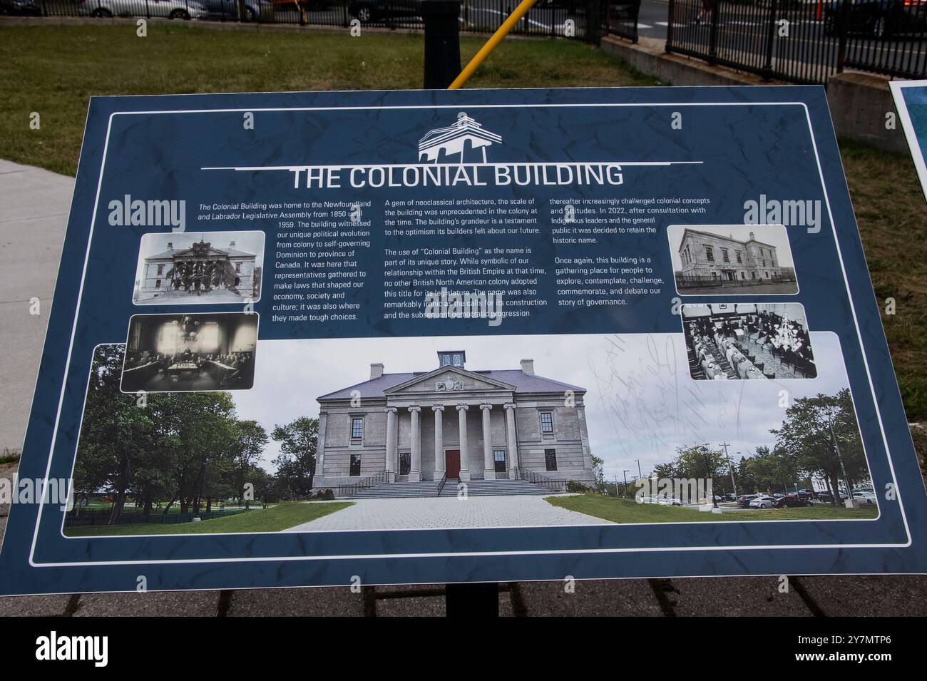 Information sign on the history of the Colonial Building on Military ...