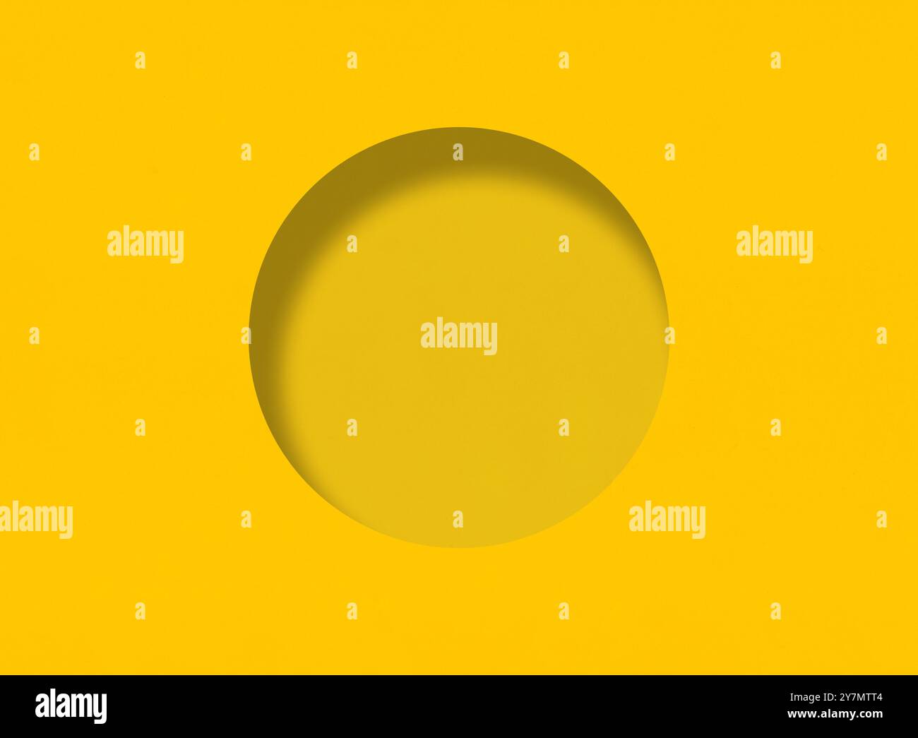 Yellow paper background with minimalistic round hole and have shadow ...