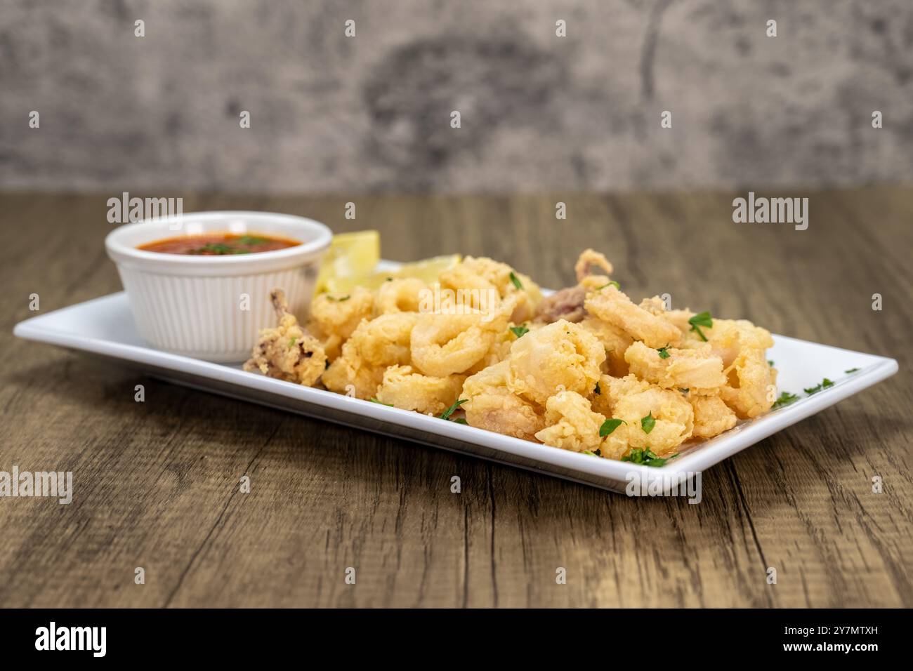 Overhead view of deep fried baby squid calamari rings served as and ...