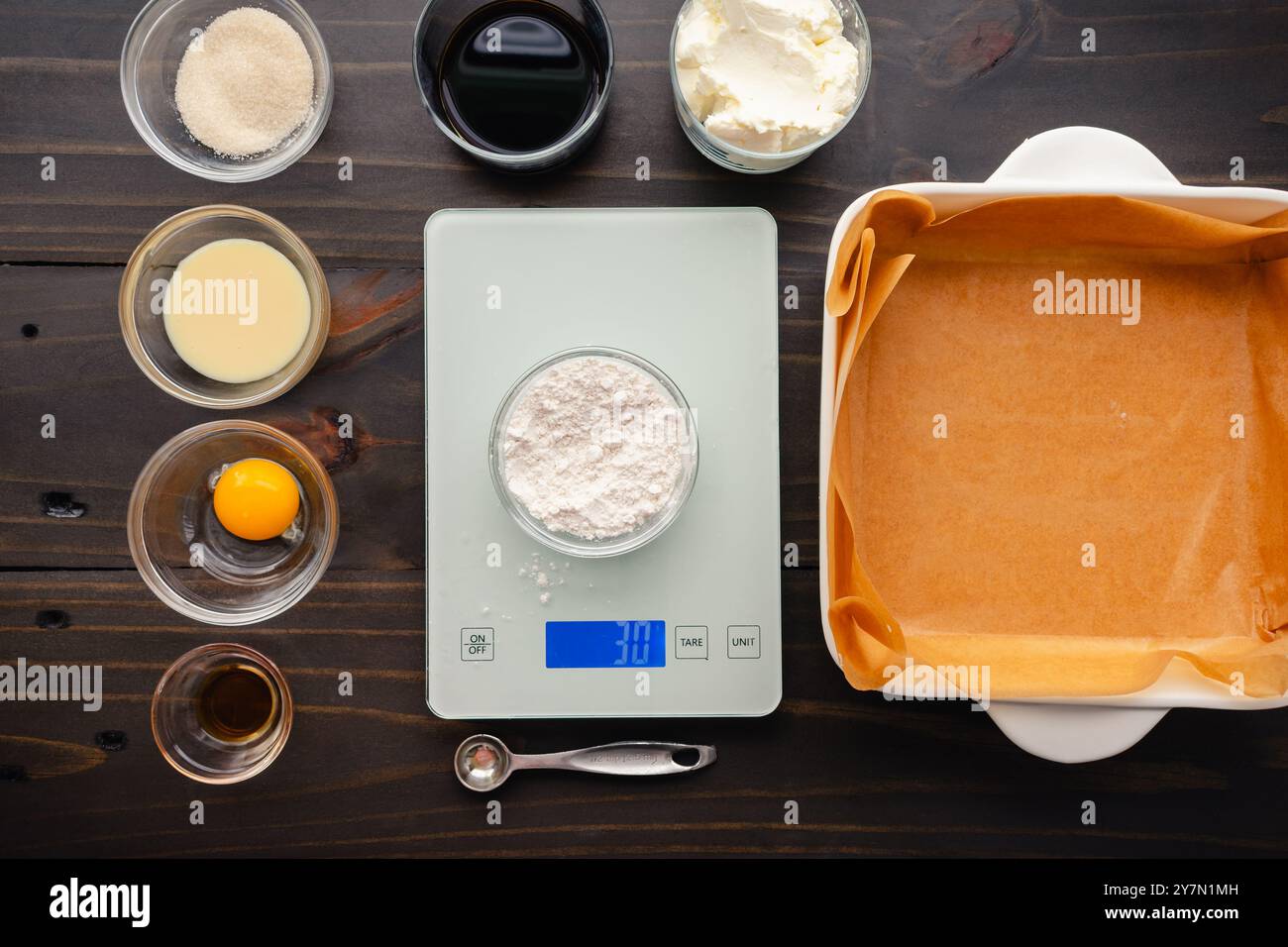 Weighing Flour on a Digital Scale Surrounded with Ingredients: Coffee ...