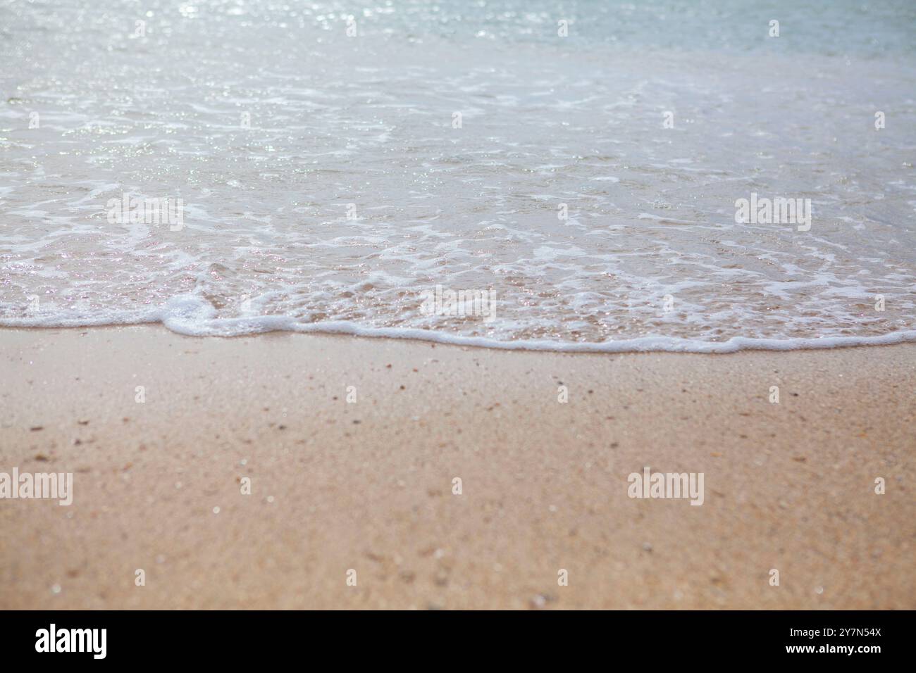 Water on beach background texture Stock Photo - Alamy