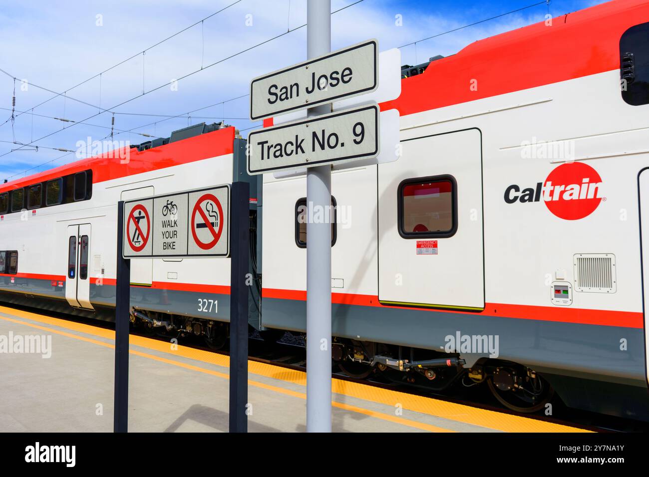 Side view of Caltrain electric train car is positioned on Track 9 at ...