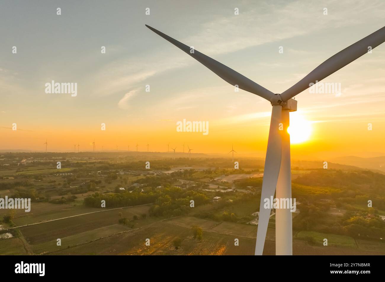 Wind farm field and sunset sky. Wind power. Sustainable, renewable ...