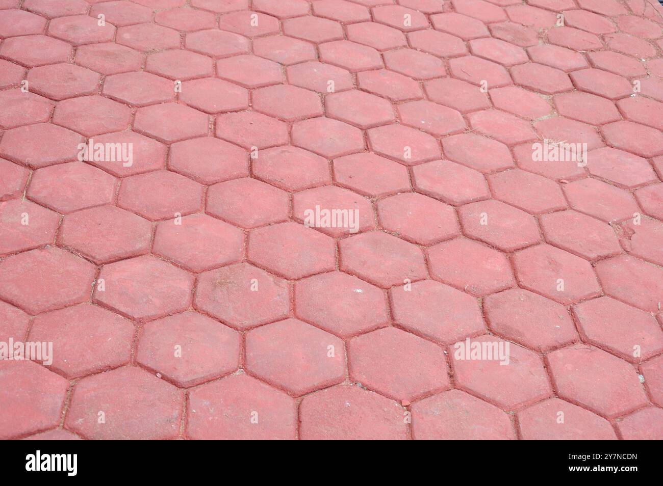 pattern octagonal on the red paving block Stock Photo - Alamy
