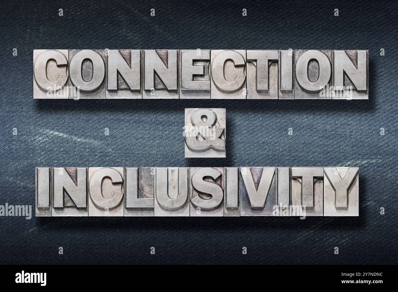connection and inclusivity phrase made from metallic letterpress on ...