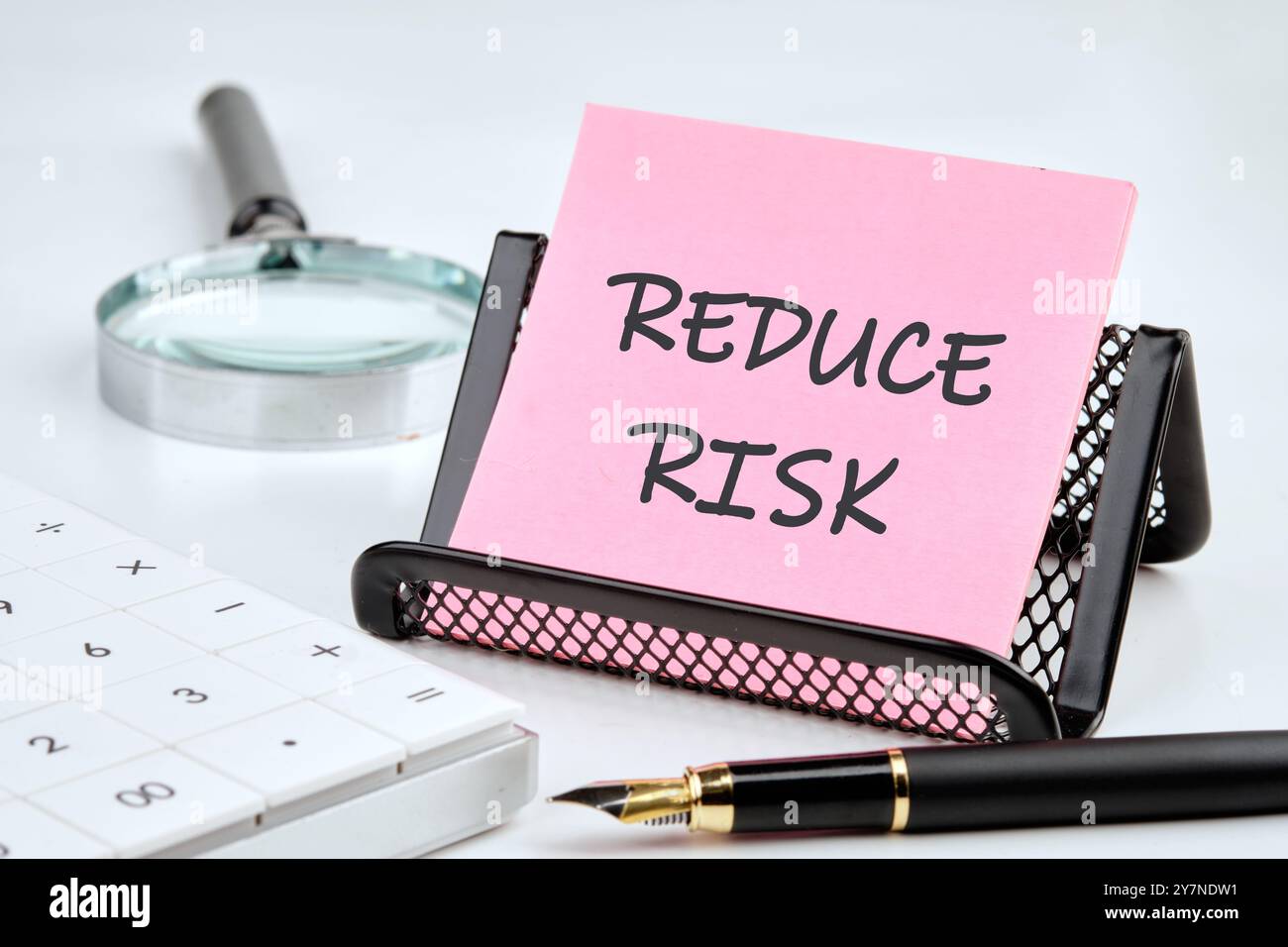 Conceptual reduce risk symbol. Copy space. Words REDUCE RISK on the ...
