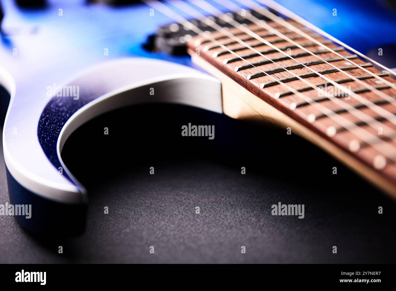 Fretboard of modern electric guitar. Close up Stock Photo - Alamy